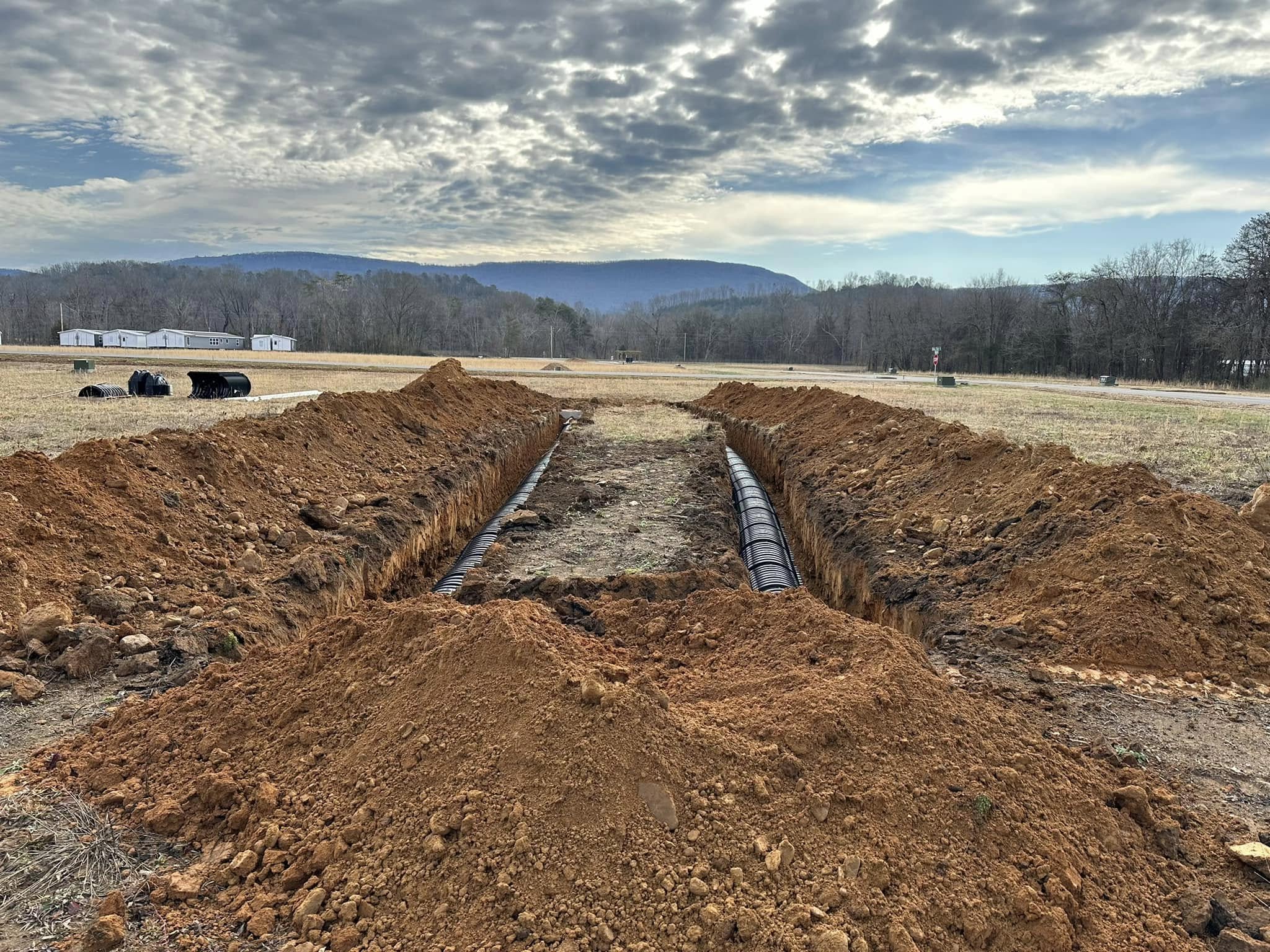 Septic Tank Installation & Field Lines - Whitzell Excavation